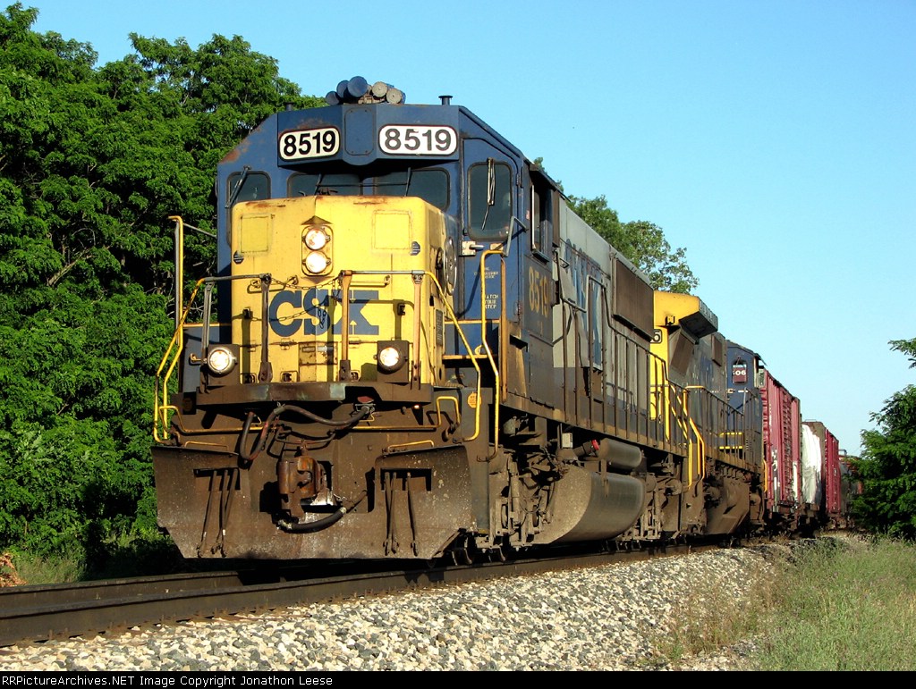 CSX 8519 leads Q327-14 past Rider's Hobby Shop